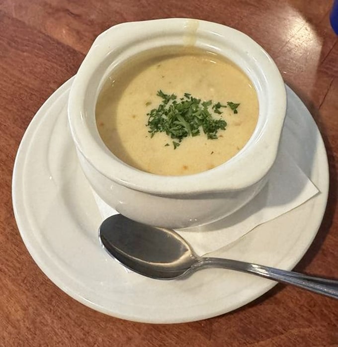 A bowl of she-crab soup that whispers, "Cancel your afternoon plans"&mdash;velvety, rich, and worthy of being sipped slowly while contemplating life's greatest mysteries.