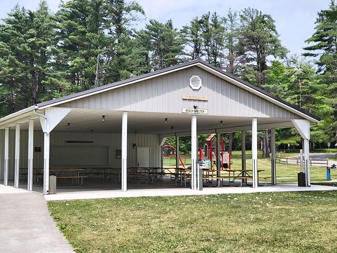 This shelter offers more than shade—it's a gathering place where picnic memories are made and rainy days become part of the adventure.