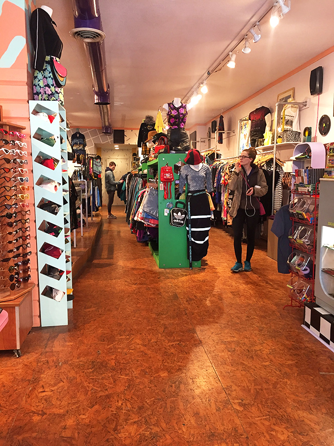 Treasure hunters navigate the carefully curated chaos, where every rack turn might reveal the jacket your cooler cousin wore to that concert in '92.