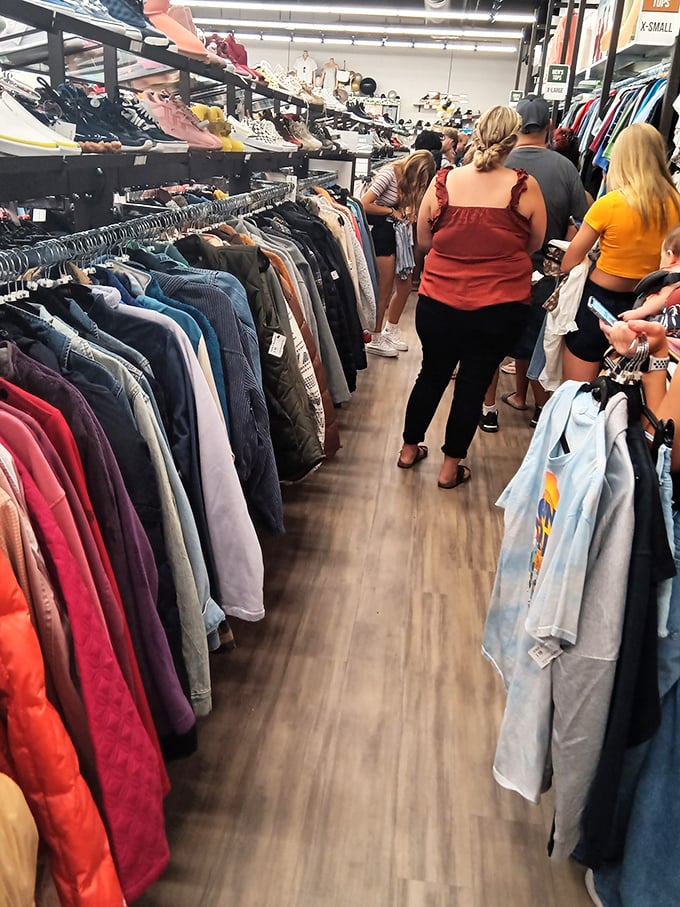 The thrill of the hunt brings shoppers together in these well-organized aisles. Fashion democracy in action&mdash;no trust funds required.