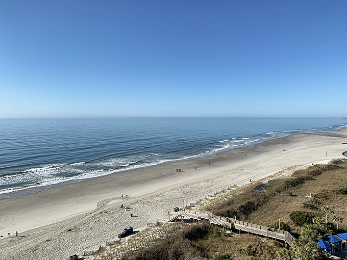 Golden hour transforms ordinary sand into a canvas of light and shadow &ndash; no filter required on Folly's natural masterpiece.