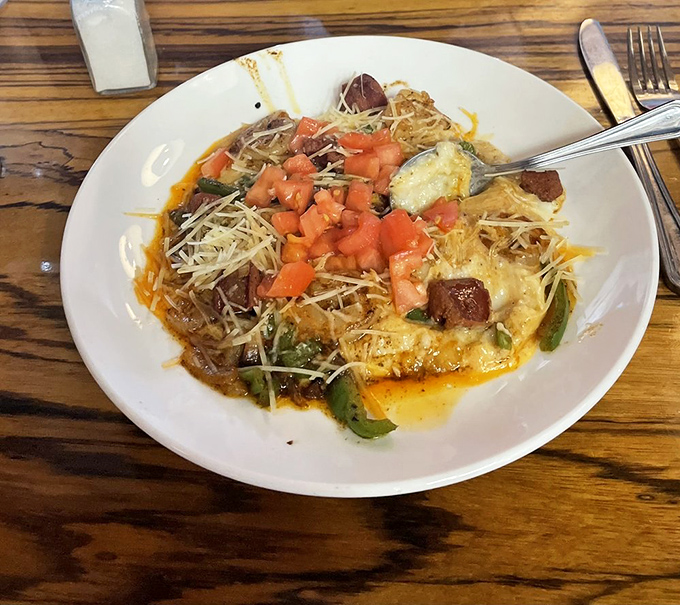 A Southern symphony on a plate &ndash; shrimp and grits elevated with fresh tomatoes and cheese that would make even a Charleston blue blood swoon.