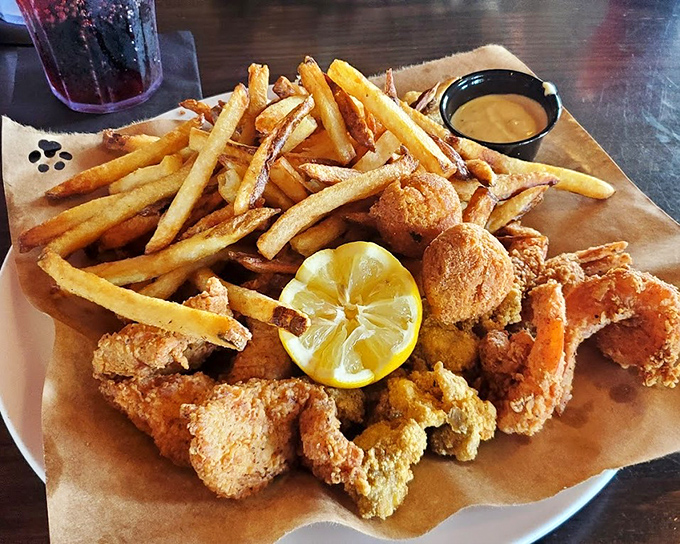 Cornmeal-crusted perfection with fries that could start their own fan club. The lemon wedge isn't garnish&mdash;it's essential supporting cast.