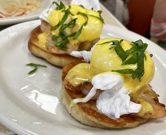 Eggs Benedict with shrimp &ndash; because Florida knows that brunch without seafood is just a late breakfast with permission to drink mimosas.