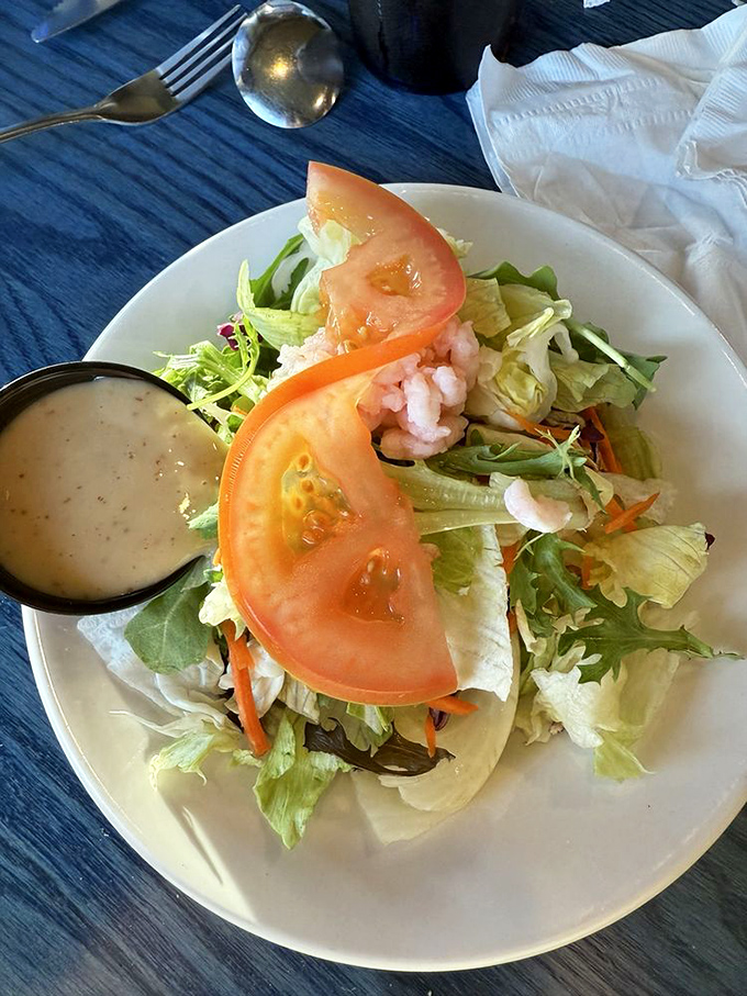 Garden-fresh greens crowned with plump shrimp and a side of chowder. It's the culinary equivalent of having your cake and eating it too.