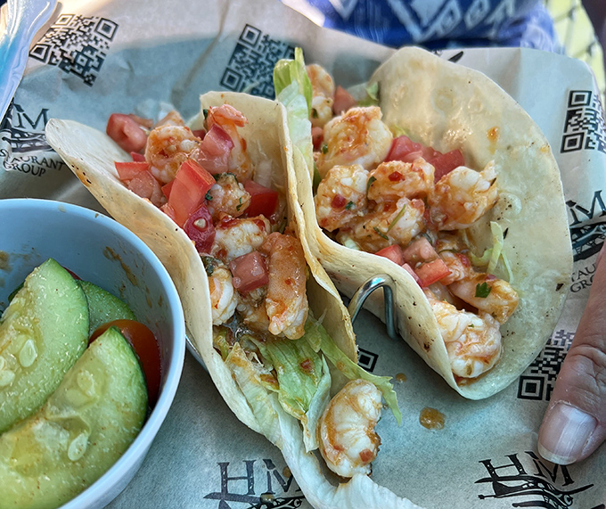 Shrimp tacos deliver Gulf Coast flavor wrapped in soft tortillas, proving fusion can be fantastic.
