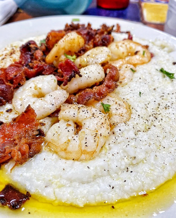 Shrimp and grits elevated to an art form, with crispy bacon adding that smoky counterpoint to creamy Southern comfort.