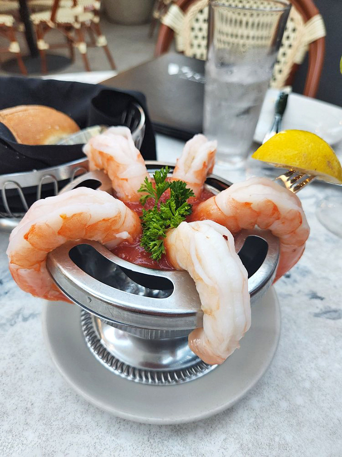 These jumbo shrimp hang off their silver pedestal like acrobats, just waiting to take a dive into that zesty cocktail sauce.