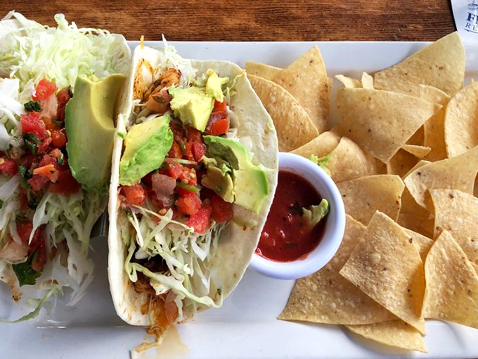 These fish tacos don't just speak—they sing with fresh cabbage, avocado, and pico de gallo. Tortillas as the backup singers to seafood's lead vocals.