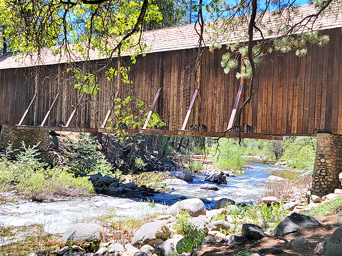 The side view reveals the bridge's elegant profile, standing proud against the Sierra Nevada backdrop.