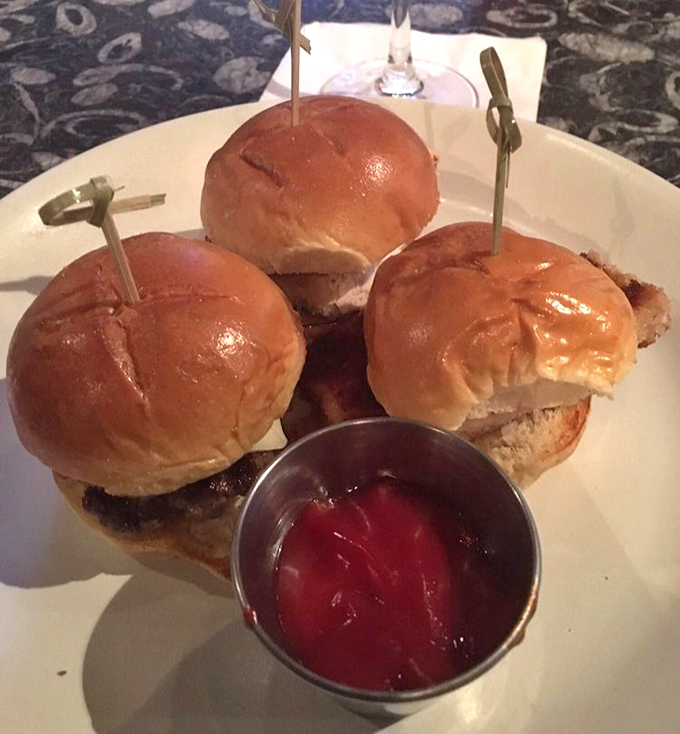 These sliders aren't "mini burgers"&mdash;they're perfectly proportioned flavor bombs, served with a side of nostalgia and house-made condiments.