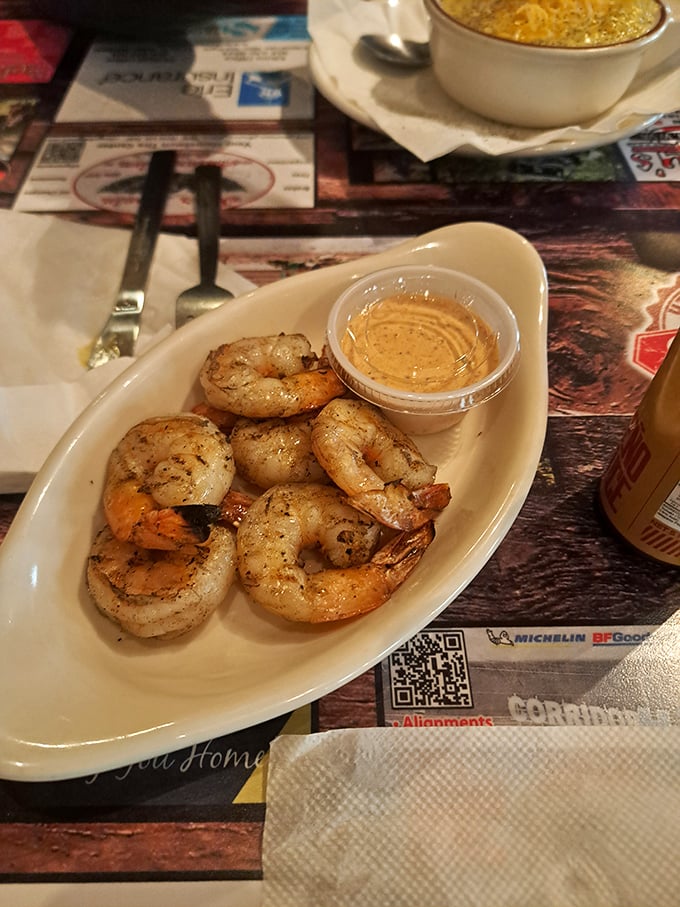 These perfectly grilled shrimp with dipping sauce prove Smoke on the Water isn't just about meat. Even seafood gets the star treatment here.