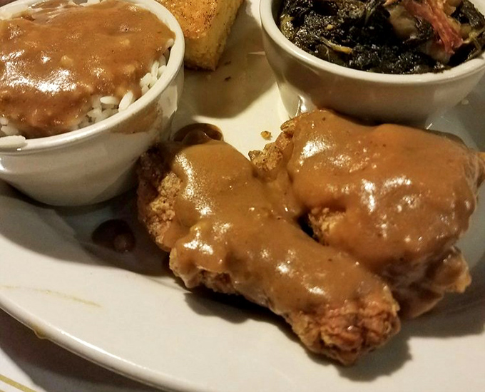 Smothered chicken that doesn't just whisper comfort – it belts it out like Aretha Franklin in her prime. That gravy deserves its own fan club.