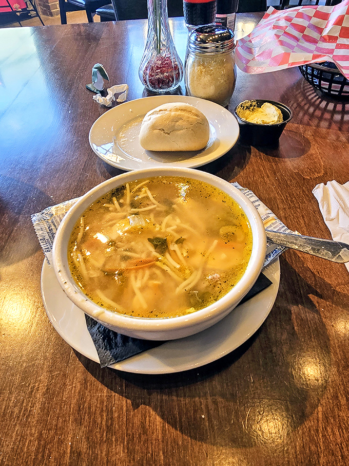 Soup that's clear enough to read your fortune in, yet flavorful enough to make you forget your troubles. That sourdough roll is standing by for dunking duty.