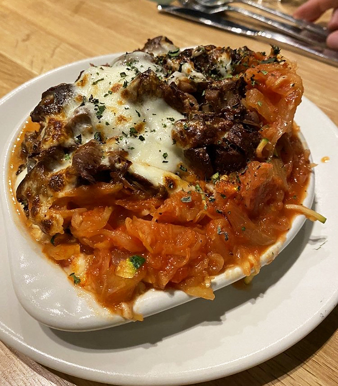 Spaghetti squash casserole that performs the ultimate magic trick: satisfying your pasta craving while keeping things gloriously light and vegetable-forward.