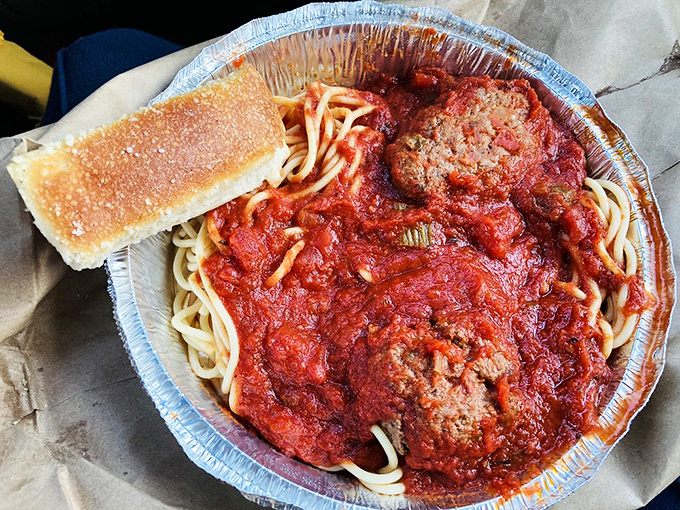 Spaghetti and meatballs served in an aluminum container might not be fancy, but it's the comfort food equivalent of a warm hug.