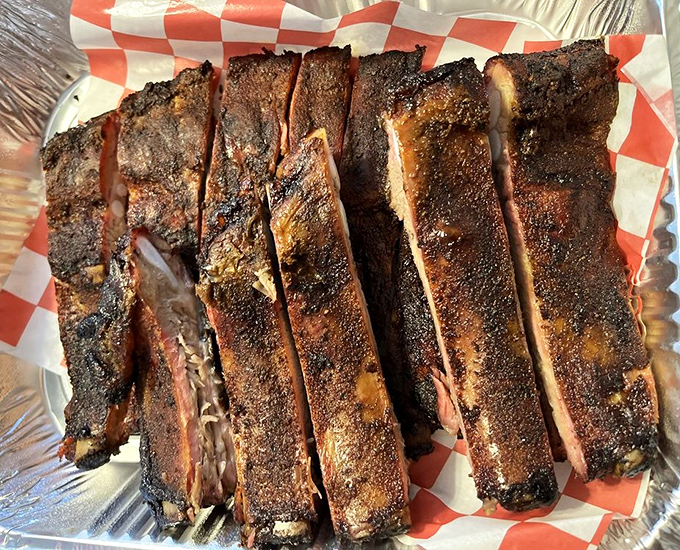 Ribs with bark so perfect they could teach a masterclass. The kind of meat that makes vegetarians question their life choices.