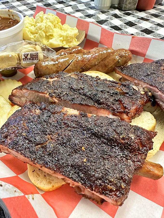 These ribs and potato salad aren't just lunch&mdash;they're a reminder that happiness is sometimes as simple as perfectly smoked meat on a red checkered paper.