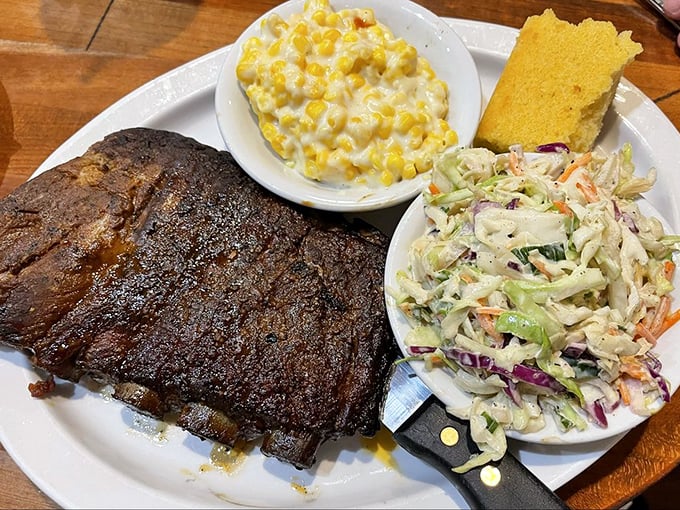 A barbecue trinity: ribs, corn nuggets, and mac and cheese. The holy smoke alliance that makes diets temporarily irrelevant.