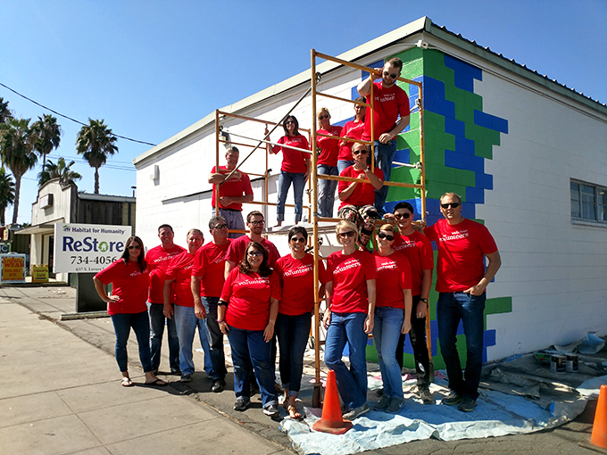 The real heroes wear red! These volunteers transform donations into housing opportunities while creating a shopping experience worth driving for.