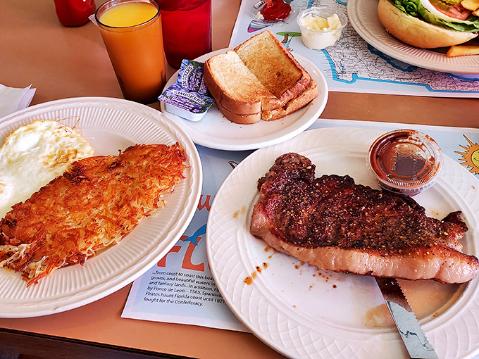 The breakfast of champions: a perfectly seared steak alongside crispy hash browns and eggs&mdash;proof that sometimes the simplest pleasures are the most profound.