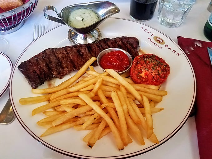 Steak frites done right &ndash; a perfectly seared cut alongside a mountain of golden fries that somehow stay crispy until the last bite. Magic!