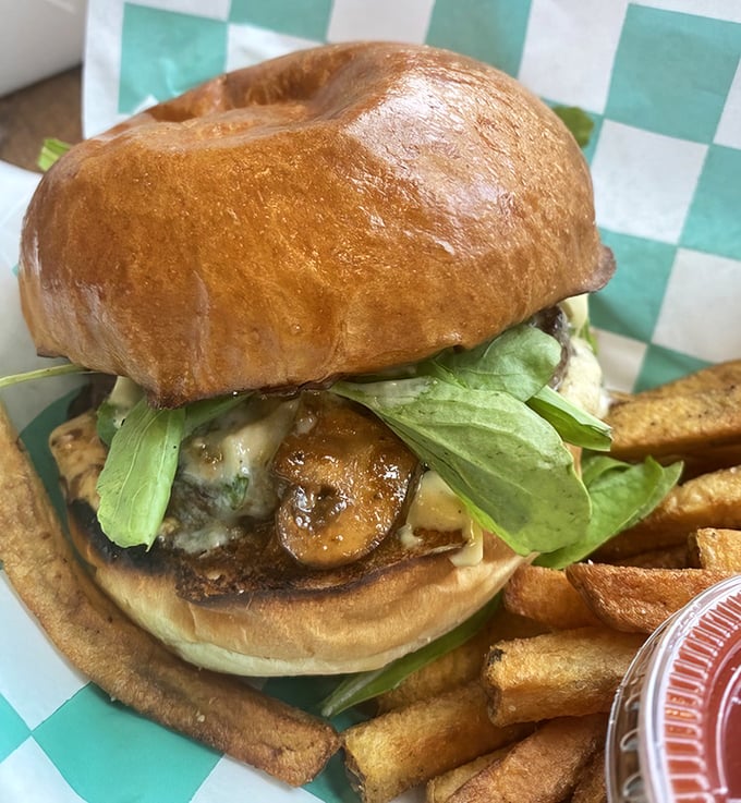 The Steakhouse Burger&mdash;where mushrooms and blue cheese have found their forever home atop a perfectly seared patty. Arugula adds peppery sophistication.