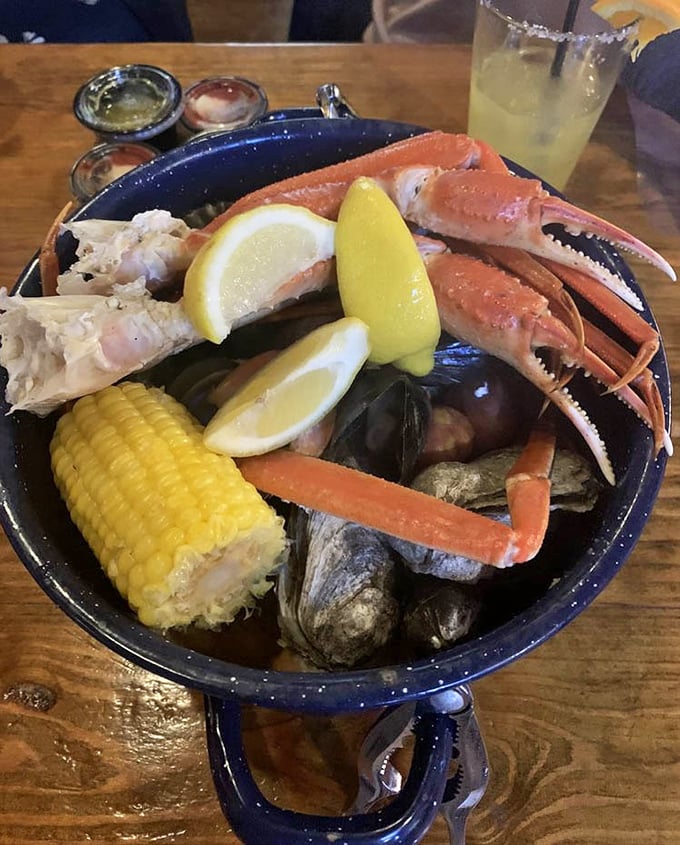The Steampot Seafood Boil arrives like a treasure chest of the sea &ndash; crab legs, corn, and all the fixings for a gloriously messy feast.