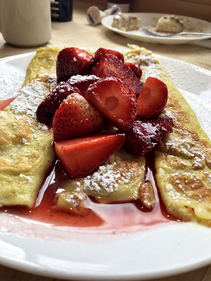 Strawberry crepes that strike the perfect balance between "I'm being fancy today" and "I deserve this." Fresh berries make it practically a salad, right?