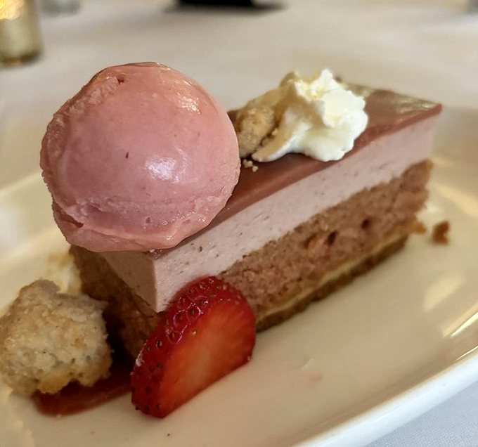 Strawberry mousse cake that makes you wonder why chocolate gets all the attention. That sorbet sidekick deserves its own fan club. 