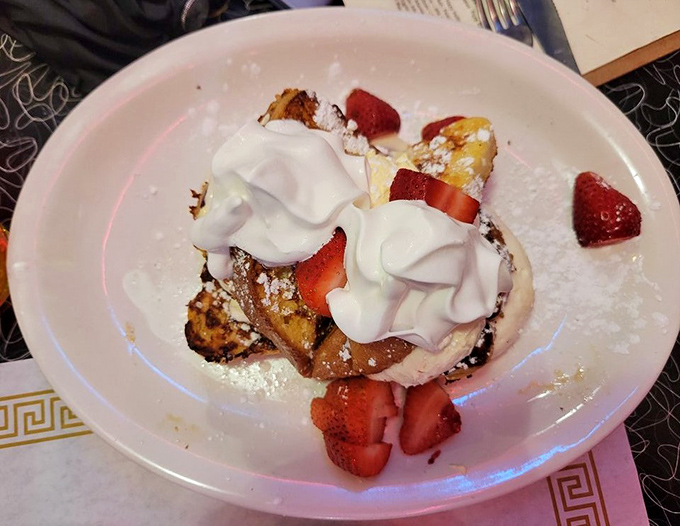 Stuffed French toast that makes regular French toast look like it's not even trying. Those strawberries add just enough virtue to justify dessert for breakfast.