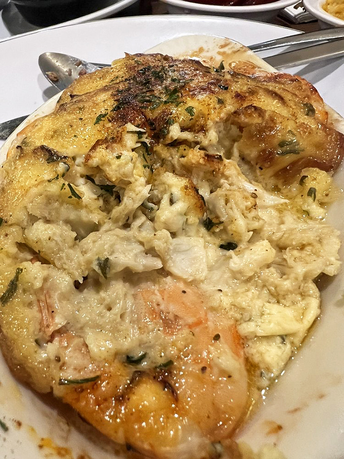 Seafood perfection that tastes like the ocean sent you a love letter. The delicate balance of crab and shrimp creates a coastal symphony.