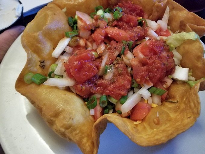 Not your average taco salad &ndash; this crispy tortilla bowl cradles a fiesta of fresh ingredients that somehow makes you feel virtuous while indulging.