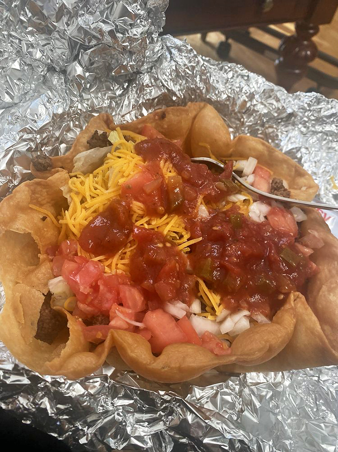 This taco salad bowl isn't just a meal, it's edible architecture&mdash;a crunchy fortress protecting a treasure of seasoned beef, cheese, and fresh veggies.