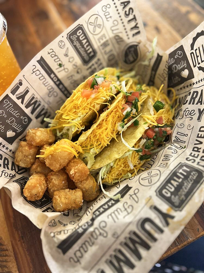 Tacos that defy expectations, served alongside golden tots. It's like the United Nations of comfort food on a single tray.