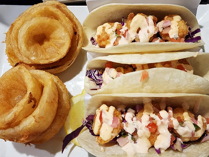 Crispy tacos flanked by golden onion rings&mdash;proof that Samosky's knows comfort food extends well beyond the pizza universe.