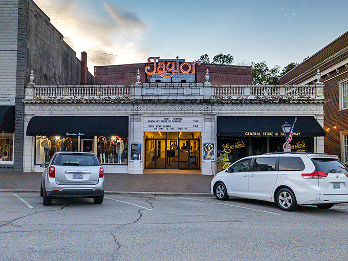 The Taylor Theater's vintage marquee lights up downtown Edenton at dusk, promising entertainment in a setting that feels delightfully frozen in time.