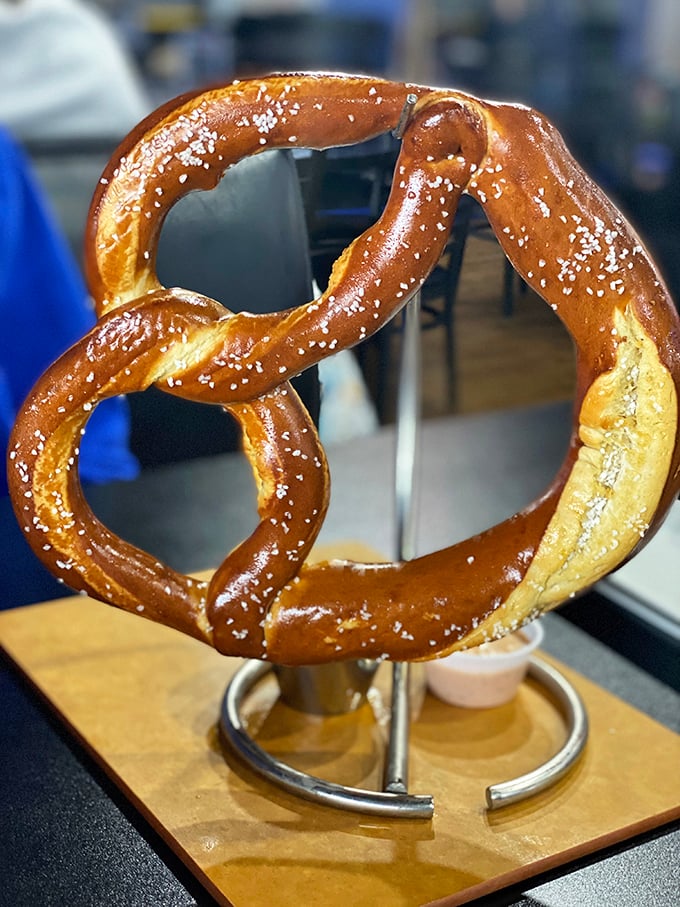 The Big Bavarian Pretzel stands tall like edible architecture. Imported from Germany, this twisted masterpiece with its perfect salt crystals demands to be photographed before devoured.