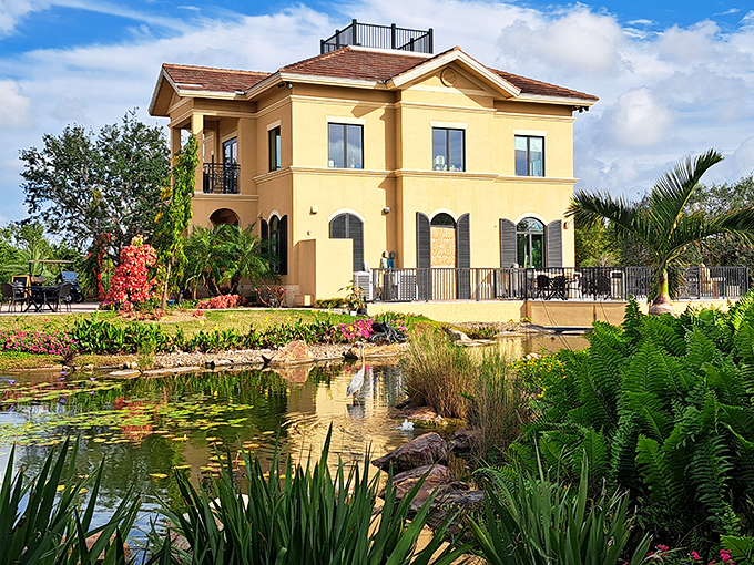 Mediterranean elegance meets Florida sunshine at this stunning building, where even the lily pads seem to gather for a better view.