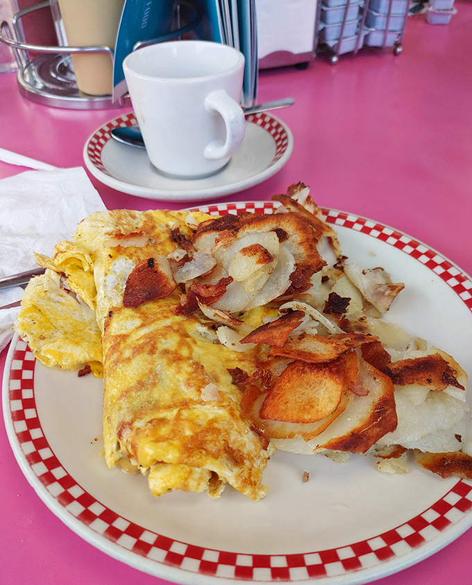 When breakfast can't decide what to be, it becomes this glorious omelet with crispy potatoes. Morning indecision never tasted so good.