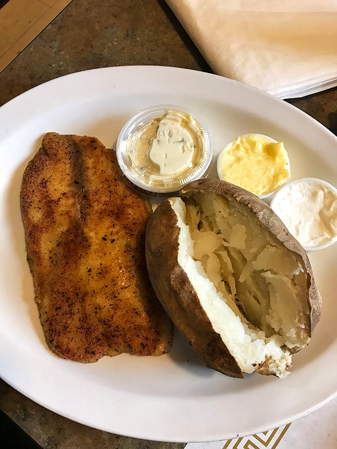 Perfectly seasoned tilapia meets its match in a fluffy baked potato. Simple food done right doesn't need fancy plating&mdash;just an appetite and appreciation.
