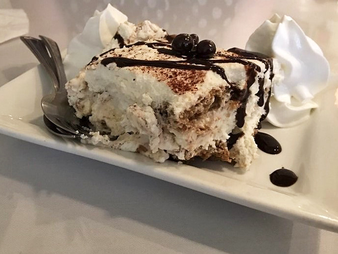 Tiramisu that strikes the perfect balance between coffee-soaked decadence and cloud-like mascarpone—the dessert equivalent of a standing ovation.