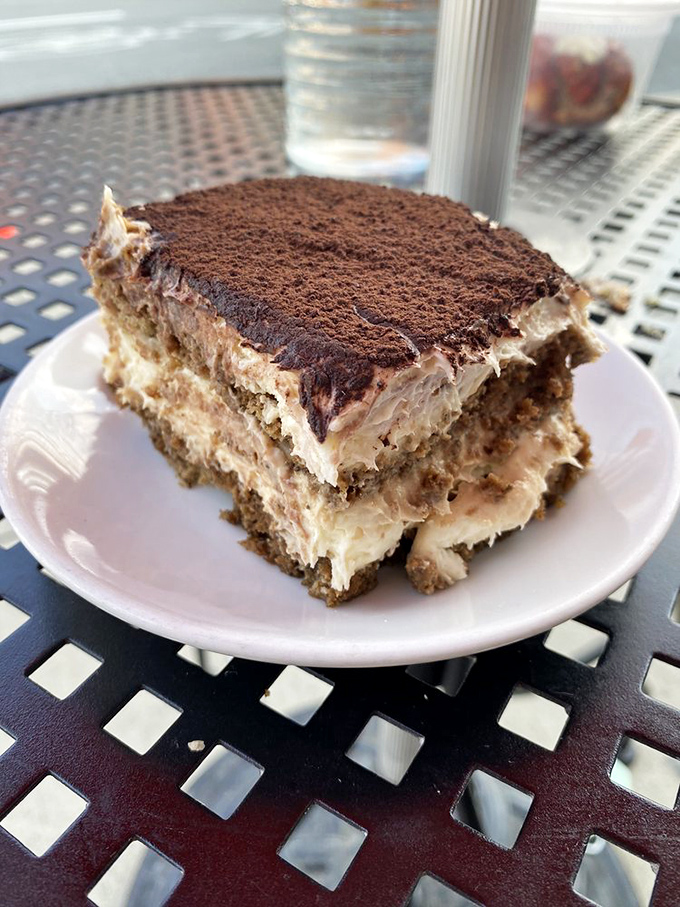 Tiramisu that doesn't skimp on the cocoa dusting &ndash; each layer promising the perfect balance of coffee, mascarpone, and "just one more bite."