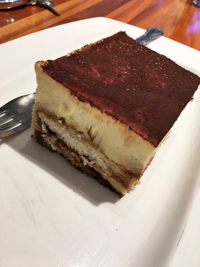 Tiramisu so perfectly layered it could teach geology classes&mdash;coffee-soaked ladyfingers supporting creamy mascarpone like delicious sedimentary strata.