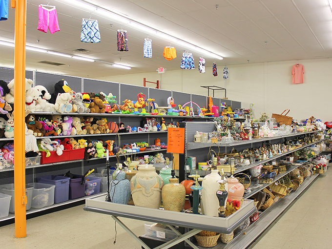 Stuffed animals and home decor living in perfect harmony. One person's decluttered space becomes another's "I can't believe I found this!"