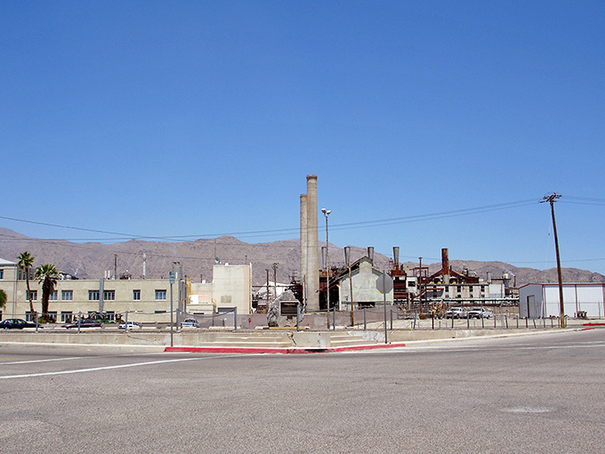 Industrial poetry in steel and concrete—the mineral processing facilities have shaped not just the skyline but the very identity of this desert outpost.