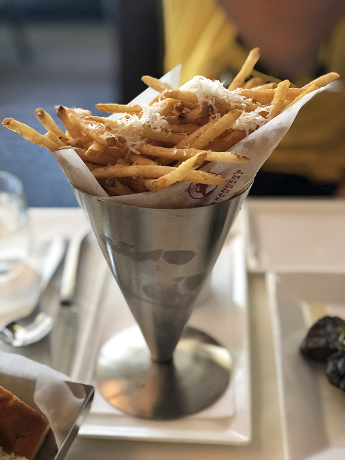 Truffle fries served in sterling silver cones - because regular baskets are for regular restaurants, not culinary temples like this.