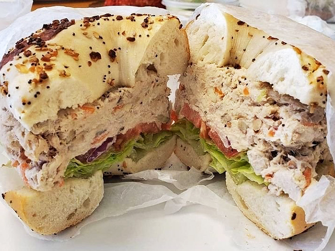 Behold the humble tuna sandwich&mdash;elevated to art form with fresh veggies and that perfect bagel foundation.