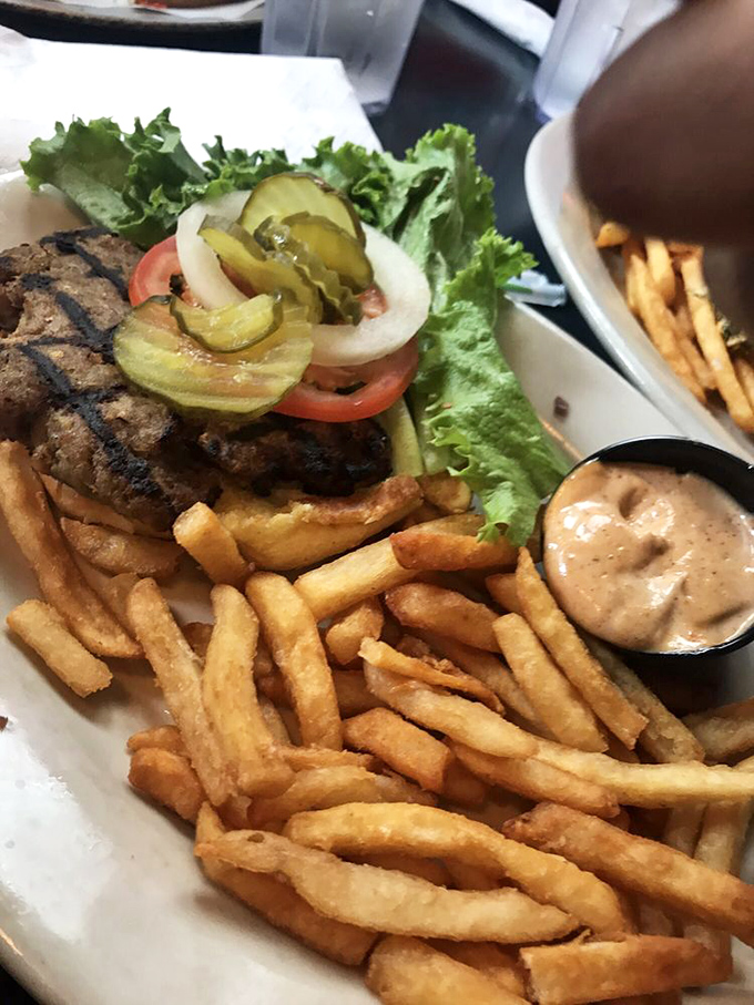 Who says turkey burgers can't be exciting? This beauty comes dressed to impress with fresh veggies and a side of perfectly golden fries.