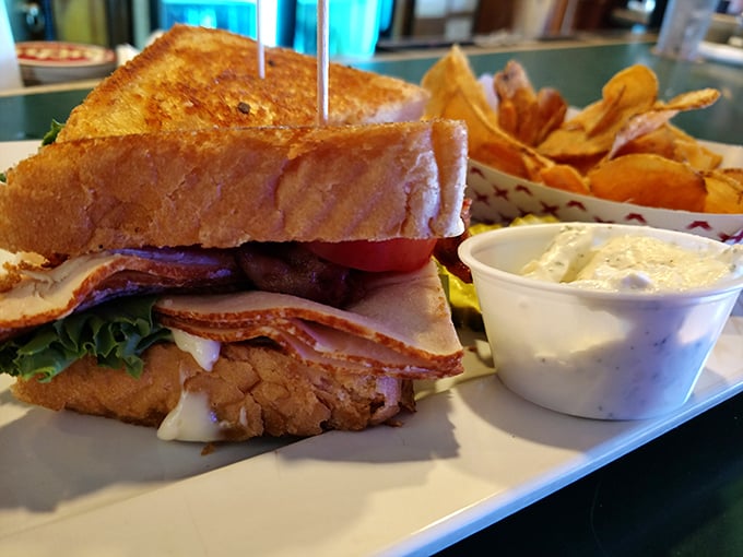The club sandwich: three stories of deliciousness held together by those little wooden skewers that somehow always end up in your pocket.